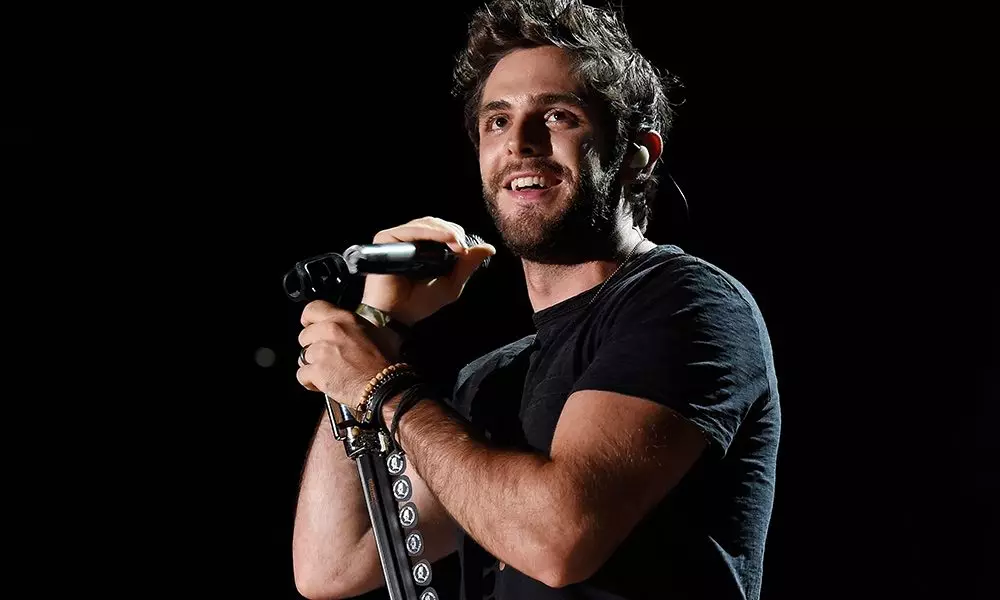 Sary Thomas Rhett nataon'i Rick Diamond sy Getty Images ho an'ny Shock Ink